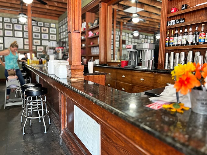 The counter where coffee flows freely and local gossip is exchanged &ndash; the true heart of any small-town cafe worth its salt.