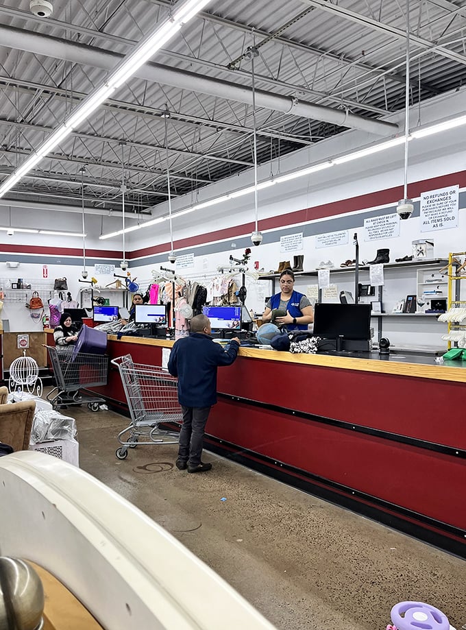 Transaction central, where today's discoveries become tomorrow's conversation pieces after a friendly exchange at the checkout counter.