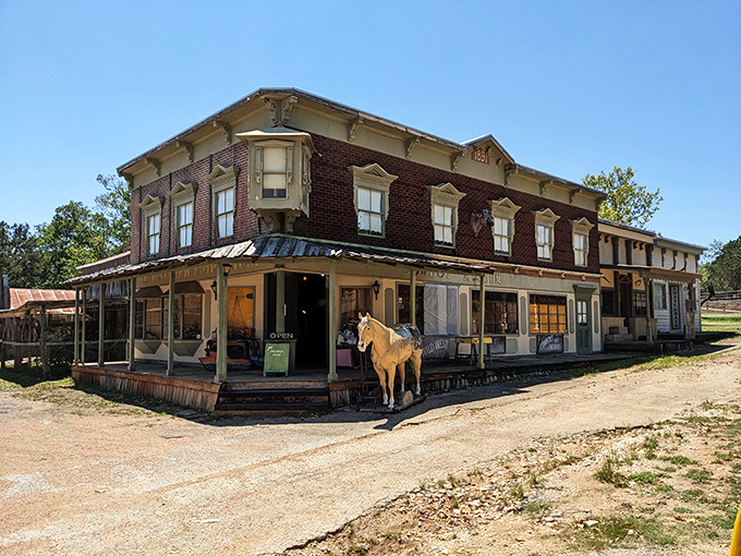 The Cowboy Museum's weathered porch and wooden horse welcome visitors to a slice of Texas heritage that feels delightfully unstaged.
