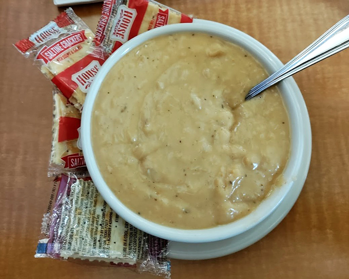 Cream of crab soup so rich it could apply for a mortgage, served with saltines that know their supporting role and play it perfectly. 