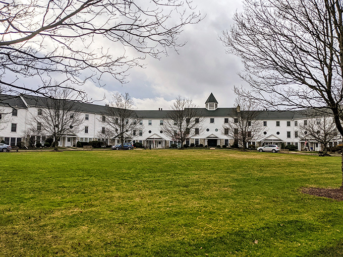 The stately Crestmont Inn stretches across the landscape like a grand ocean liner docked in a sea of green.