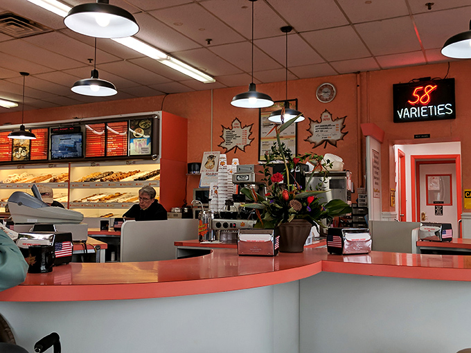 The calm before the sugar rush. Maple Donuts' interior combines retro charm with the sweet anticipation of what's in those display cases.