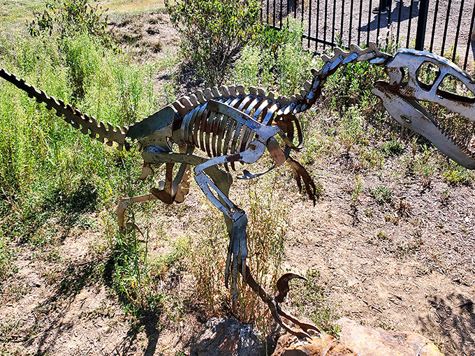 A metal Deinonychus skeleton sculpture adds artistic flair to the scientific experience. Clever girl, indeed!