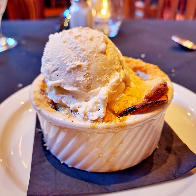 A cr&egrave;me br&ucirc;l&eacute;e with a perfectly torched top that crackles like autumn leaves. The ice cream melts slowly, creating a sweet symphony in every spoonful.