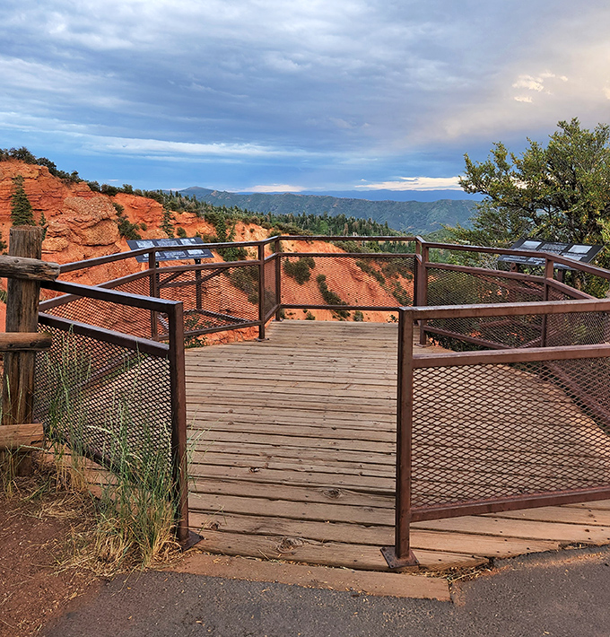 Devil's Kitchen Viewpoint offers front-row seats to nature's red rock amphitheater, no tickets required for this geological spectacular.