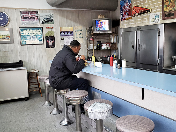 The solitary diner experience: one man, one counter, one perfect meal. Some of life's most profound moments happen over ham and eggs at a blue Formica counter.