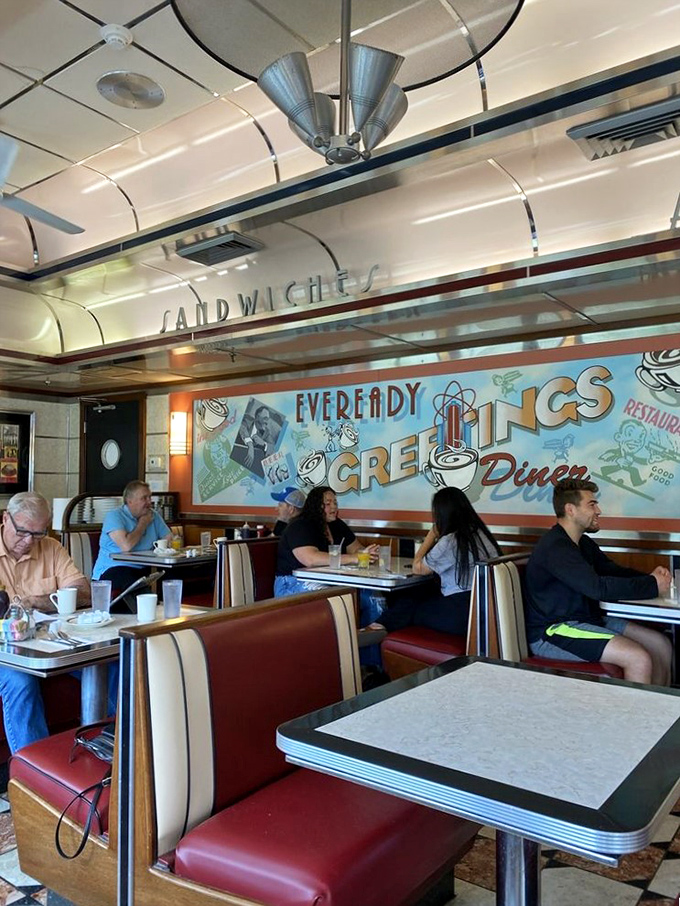 Where ceiling fans spin lazily above diners solving world problems between bites of pie and sips of coffee.