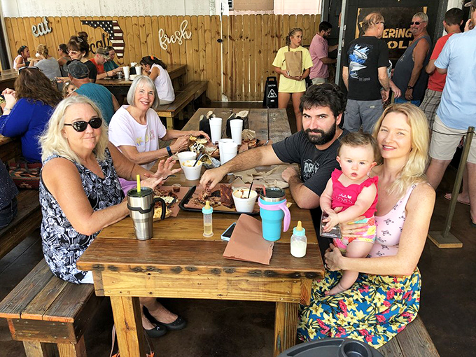 Multi-generational barbecue bliss &ndash; proof that great food brings families together better than any formal dining experience ever could.