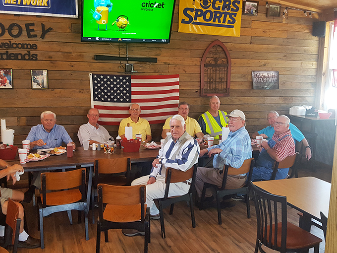 The regulars' table &ndash; where stories are swapped, BBQ is savored, and friendships are smoked to perfection over decades.