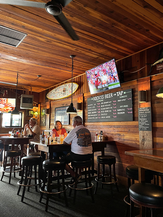 More wood paneling than a 1970s station wagon, creating the perfect amber glow for burger appreciation.