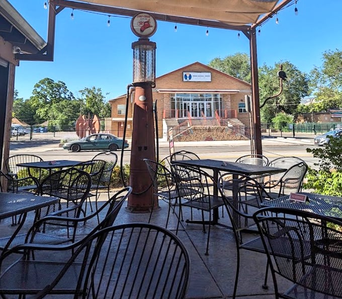 The patio offers a perfect spot for people-watching with your burger. That vintage gas pump has stories to tell.