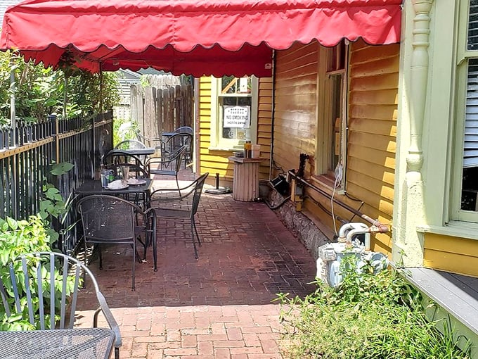 Outdoor seating that whispers, "Stay awhile." This brick patio has hosted more meaningful conversations than most therapists' offices.