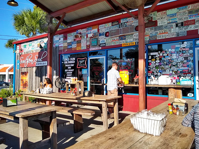 Wooden picnic tables under the coastal Georgia sky—where strangers become friends united by sauce-stained fingers and satisfied smiles.