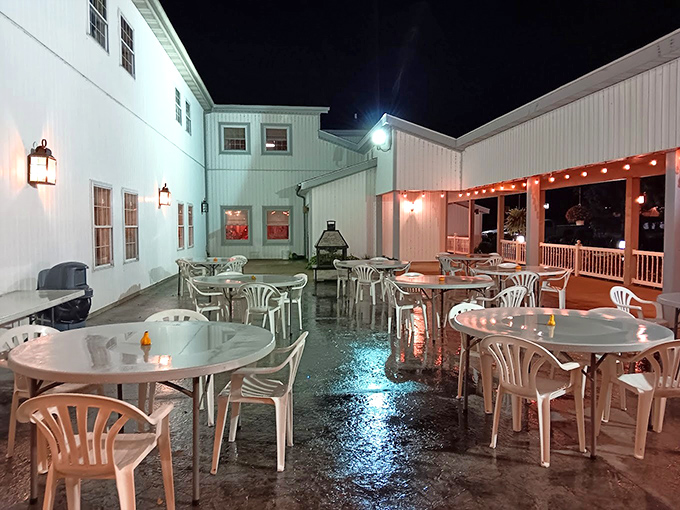 Evening dining on the patio&mdash;where string lights transform simple tables into the most romantic spot in Montgomery after sunset.