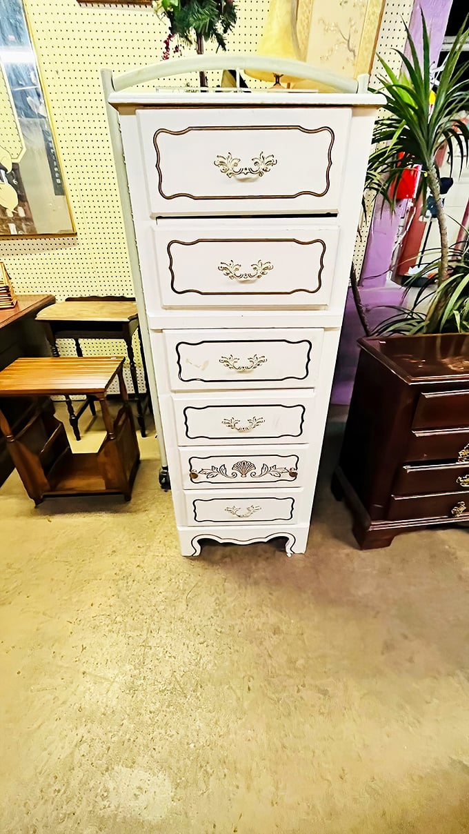 This elegant white dresser brings French provincial charm to any bedroom. Marie Antoinette would approve of those curves.