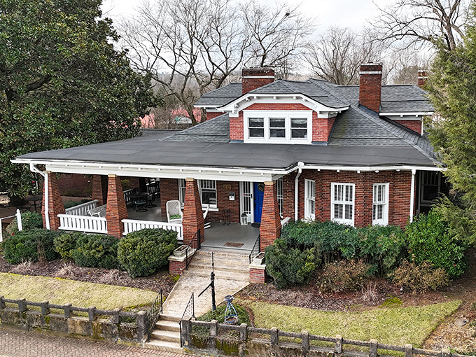 The Ellijay River House Bed & Breakfast embodies Southern hospitality in architectural form, with a porch that practically begs you to sit a spell.