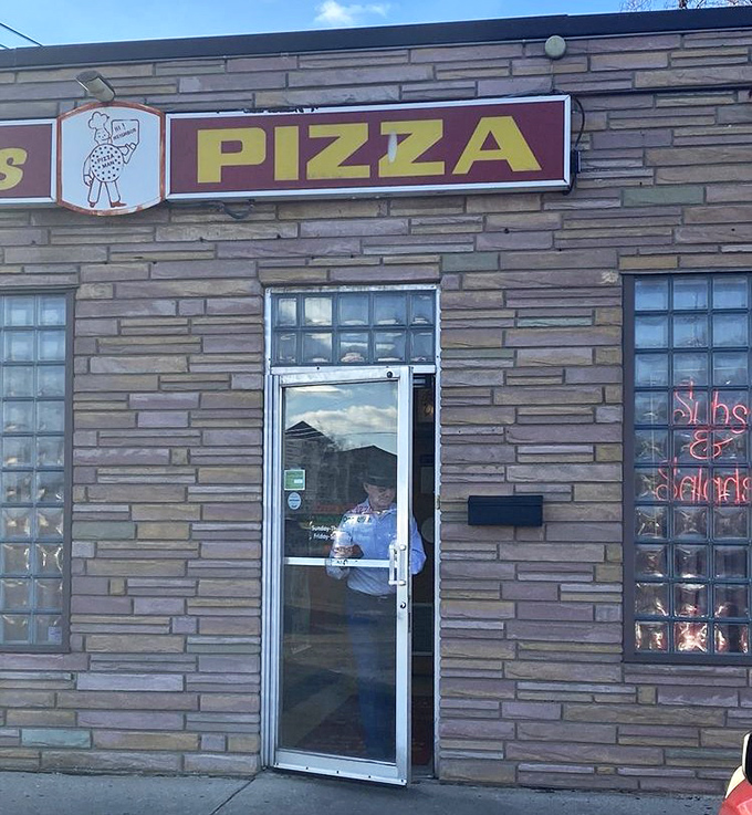 The entrance to paradise is often unassuming. This modest doorway has welcomed hungry Ohioans through countless seasons since 1959.