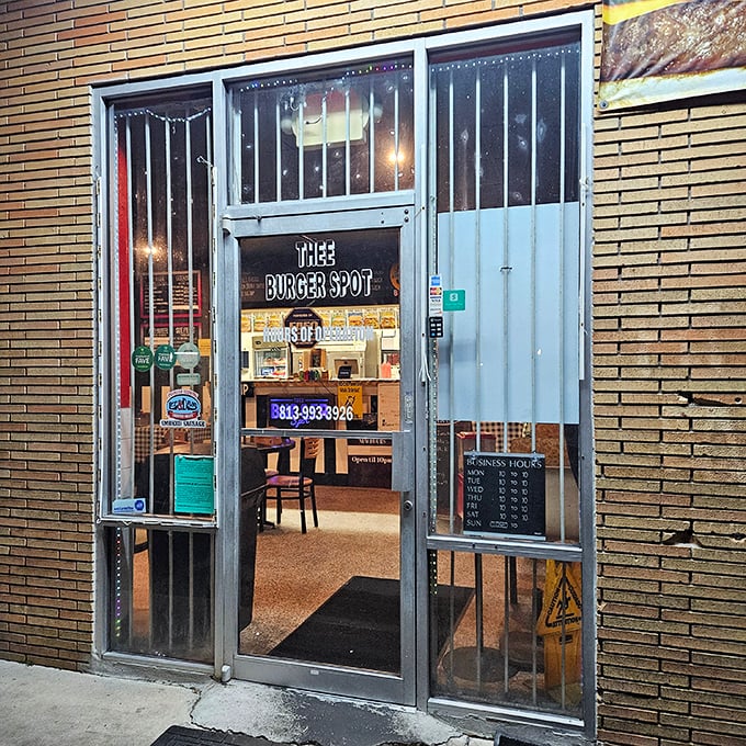 The metal-barred entrance feels like you're entering a secret club. The password? "One cheeseburger, please."