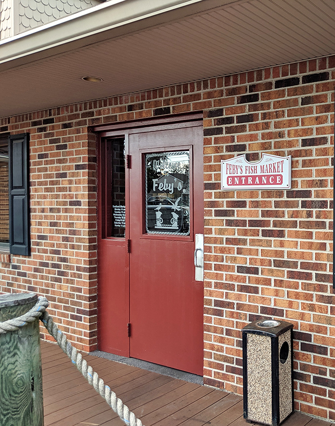 The unassuming entrance to seafood nirvana &ndash; like all great culinary adventures, this one begins with a simple red door.