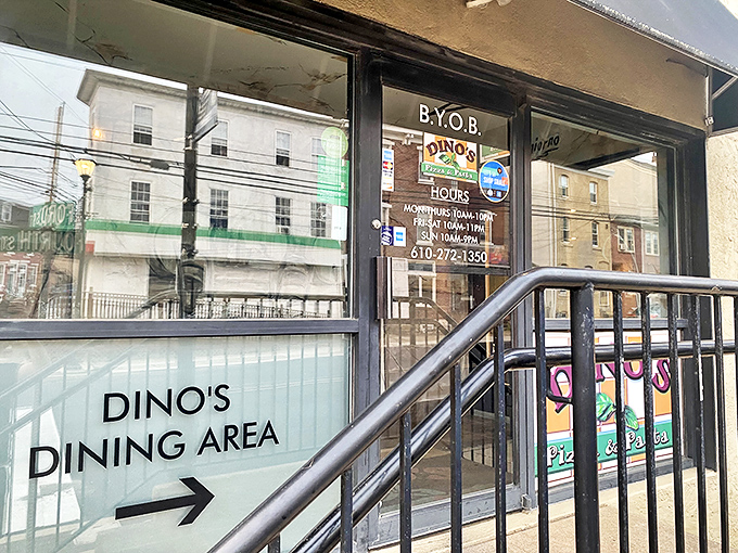 The entrance sign beckons like a lighthouse for hungry souls seeking refuge from boring dinner choices.