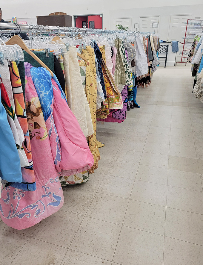 Fabric treasures cascade in colorful waves, perfect for crafters dreaming of their next creative masterpiece. 