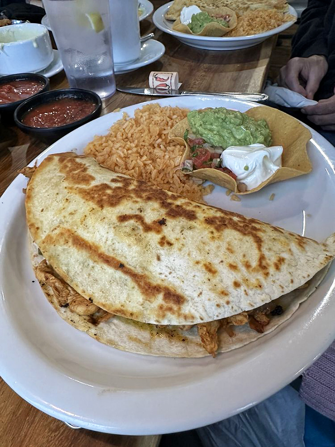 A quesadilla so perfectly golden and stuffed, it makes you wonder why you ever order anything else.