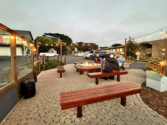 The outdoor fire pit area offers the perfect spot to wait for your table—or digest your feast while debating which dessert you should have ordered.