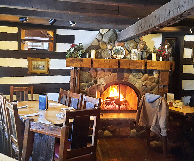 The stone fireplace doesn't just warm the room; it transforms a simple meal into a memory you'll revisit on cold winter nights.