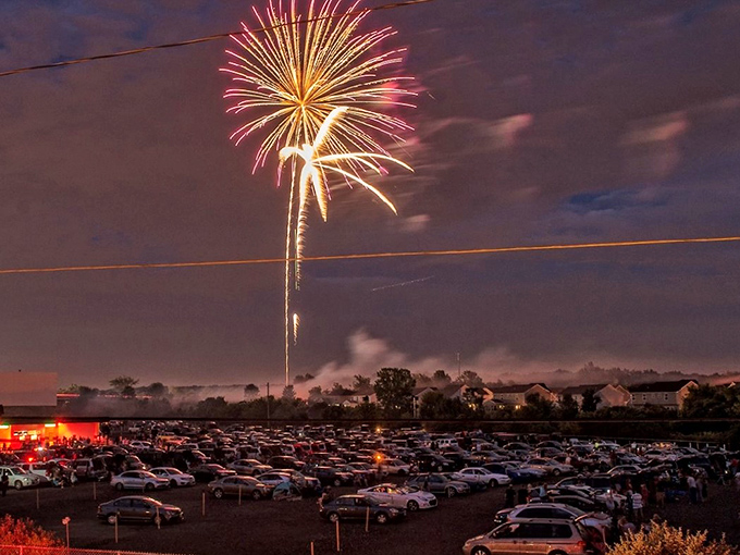 Independence Day celebrations reach new heights with fireworks bursting over parked cars&mdash;dinner, a movie, and a light show for one ticket price.