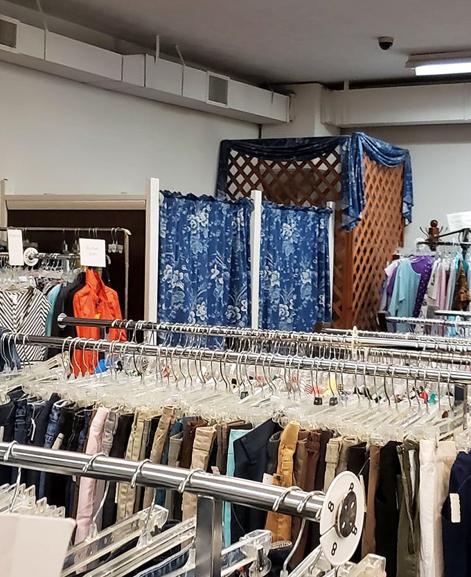 Behind the blue curtains, fashion decisions are made with brutal honesty. "Does this vintage blazer make me look like I'm playing dress-up in grandpa's clothes?"