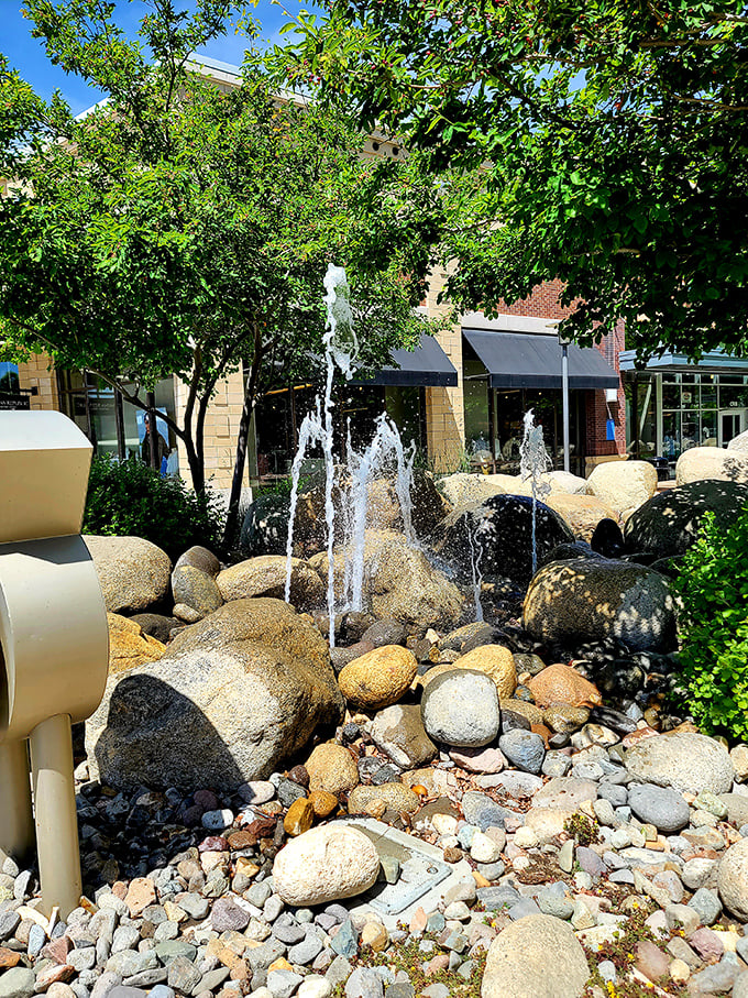 Water dances through desert rocks, creating an oasis of tranquility amid the shopping hustle. Nature's soundtrack for retail therapy.