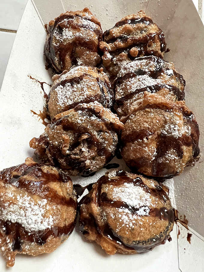 Deep-fried Oreos dusted with powdered sugar and drizzled with chocolate&mdash;proof that dessert can be both ridiculous and ridiculously good.