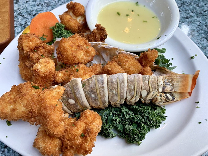 Golden-fried lobster nuggets surrounding their tail-flipping cousin&mdash;a family reunion that tastes as good as it looks.