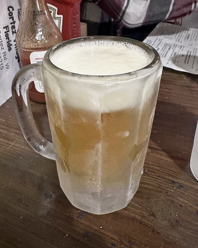 A frosty mug of beer so cold it sweats almost as much as you did finding a parking spot. Worth every bead of condensation. 