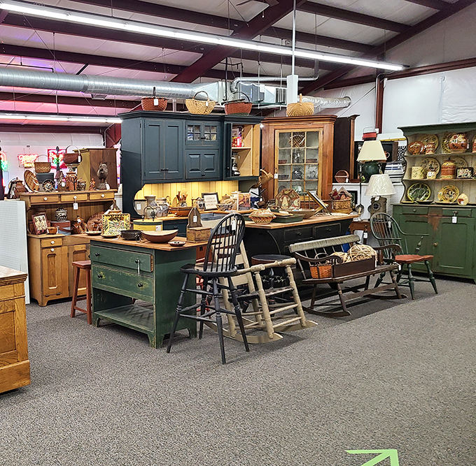 Rustic furniture display that makes modern IKEA look like it's trying too hard. Those wooden chairs have supported more family stories than a holiday dinner table. 