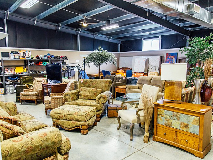 Living room sets arranged like a showroom from another era. That floral ottoman might just be the missing piece your reading nook desperately needs.