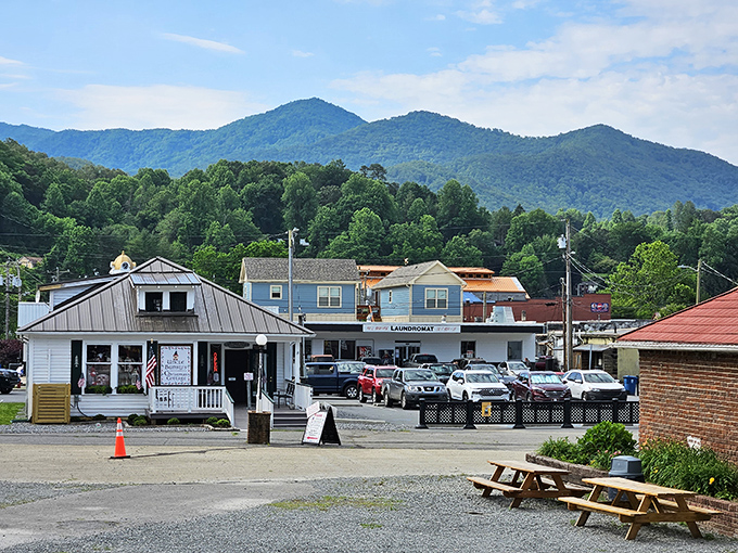 Mountain backdrop frames this railroad town. Bryson City's charming buildings nestle against the blue peaks that give the Smokies their name.