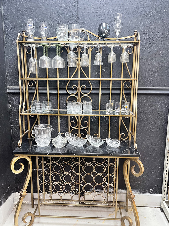 Elegant entertaining made affordable. This gold wine rack with crystal stemware screams "I have my life together" for pennies on the dollar.