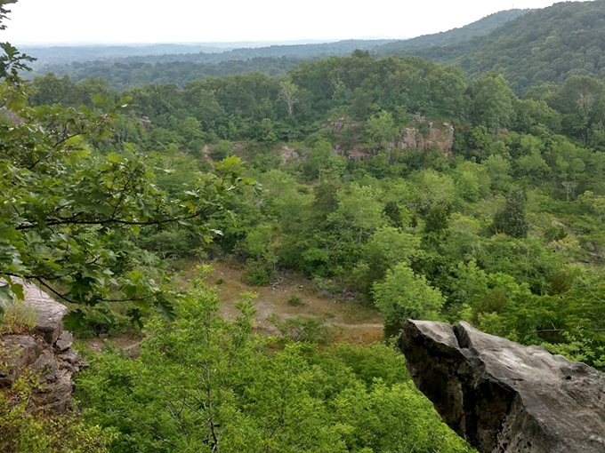 The remnants of Birmingham's mining history peek through the vibrant spring foliage, where industry and nature now coexist in peaceful harmony.