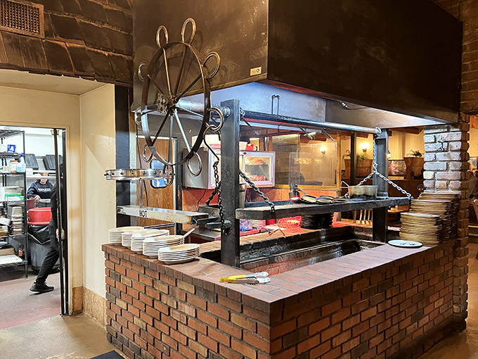 Where the magic happens &ndash; an open kitchen where flames kiss meat in a timeless ritual of transformation.