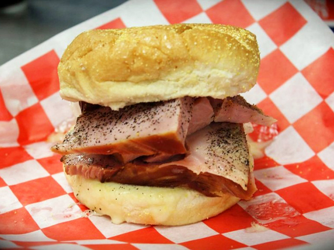 This sandwich isn't just food&mdash;it's architecture. Layers of smoky ham and melty Swiss on a bun that knows its supporting role.