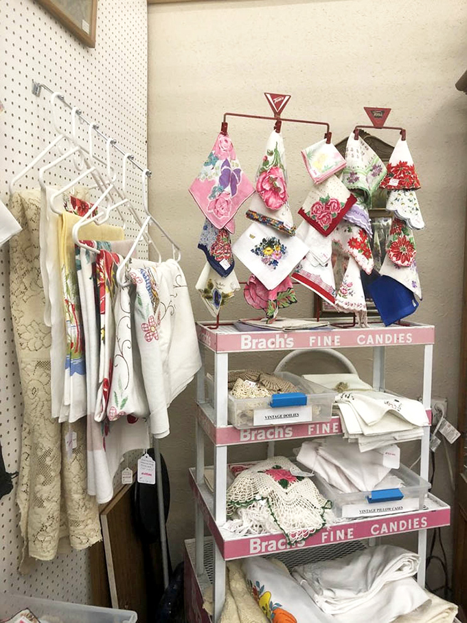A repurposed candy display now showcases delicate handkerchiefs and linens. Grandmothers everywhere would approve of this sweet preservation of the past.