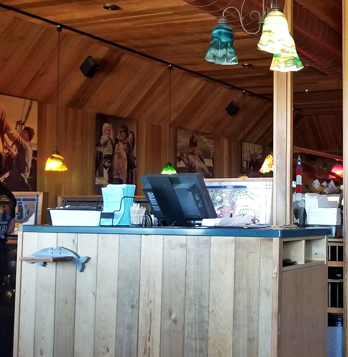 The host station glows with colorful pendant lights &ndash; your first hint that this place values character over corporate polish.