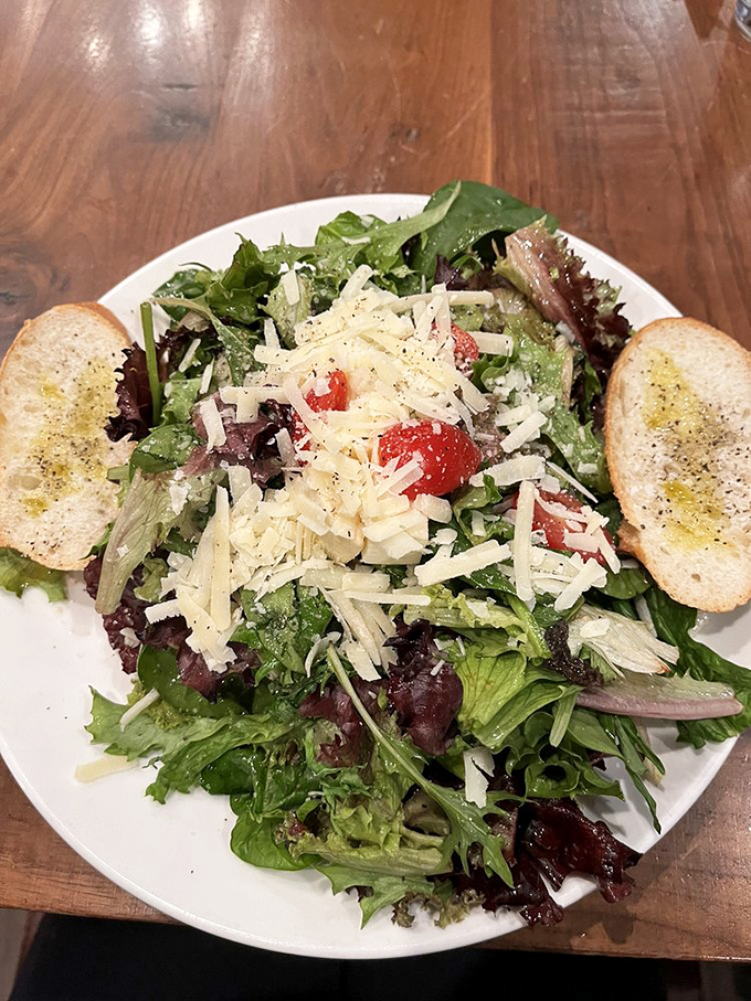 A house salad that refuses to be boring. Those shavings of Parmesan aren't garnish&mdash;they're little flavor treasures waiting to be discovered.