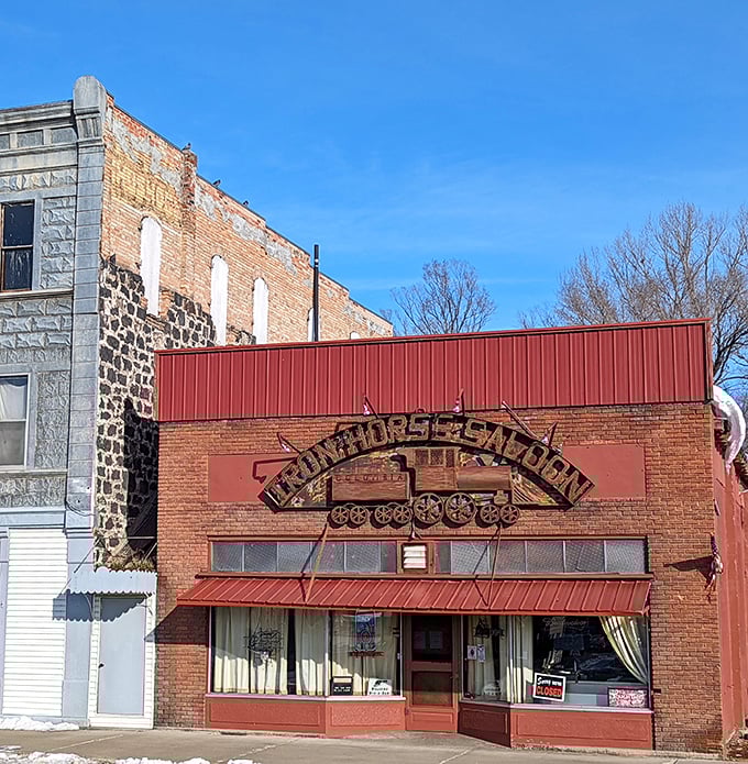 The Iron Horse Saloon's weathered brick facade and vintage sign harken back to Shoshone's frontier days, when thirsty cowboys needed a place to wet their whistles.