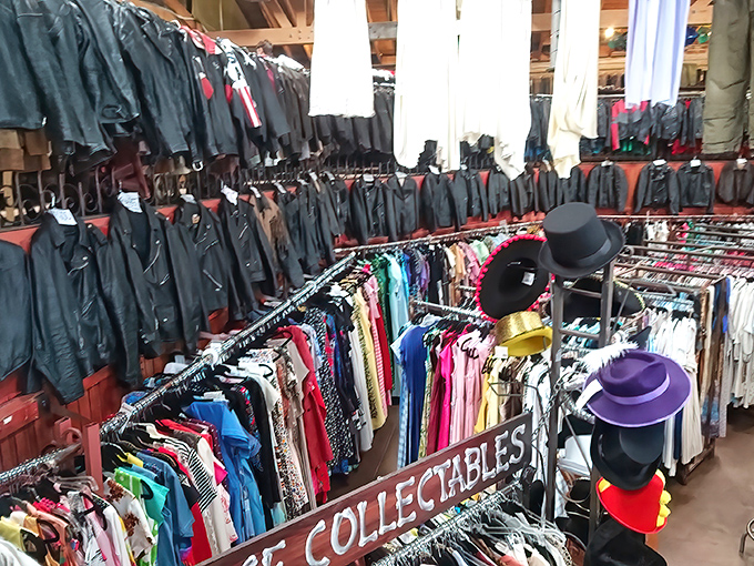 The leather jacket section: where motorcycle dreams and rock star fantasies hang side by side, each with their own patina of cool.