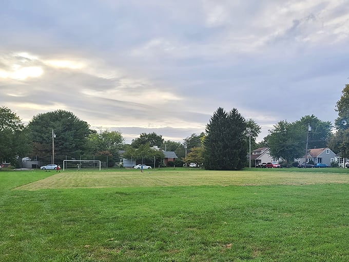 As evening approaches, Kells Park offers that quintessential small-town scene where soccer goals stand ready for tomorrow's games and memories.