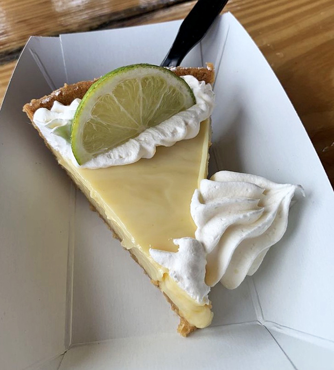 Sweet, tart, and utterly Floridian. This slice of key lime pie delivers the perfect balance of creamy, tangy, and sweet&mdash;Florida's signature dessert.