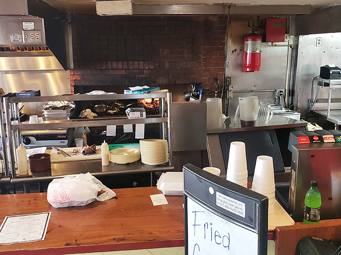 Behind the scenes where smoke and patience transform ordinary meat into extraordinary barbecue&mdash;no shortcuts, just tradition.