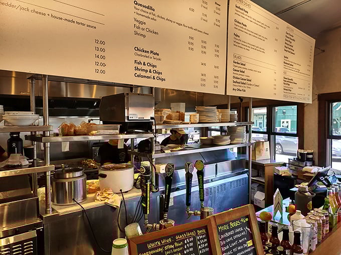 Kitchen warriors in their natural habitat, transforming the ocean's bounty into plates of paradise one order at a time.